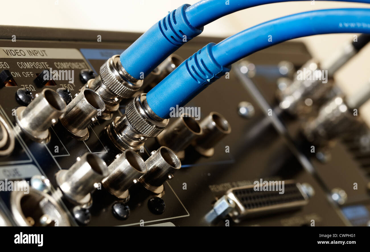 Macro shot of the 2 HD SDI-video cables and digital video connectors on ...