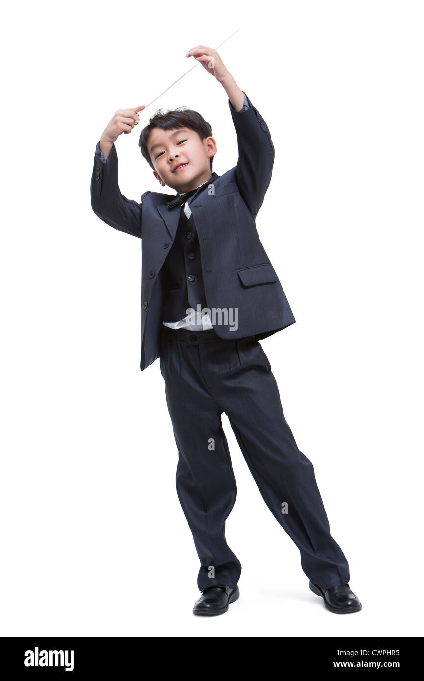 Boy dressing up like a conductor Stock Photo - Alamy