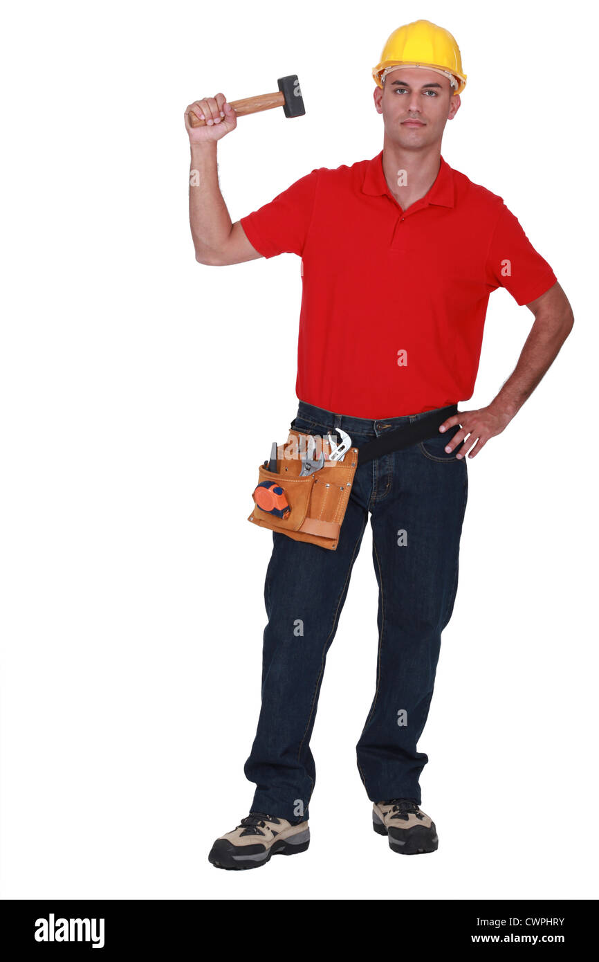craftsman striking with a hammer Stock Photo - Alamy