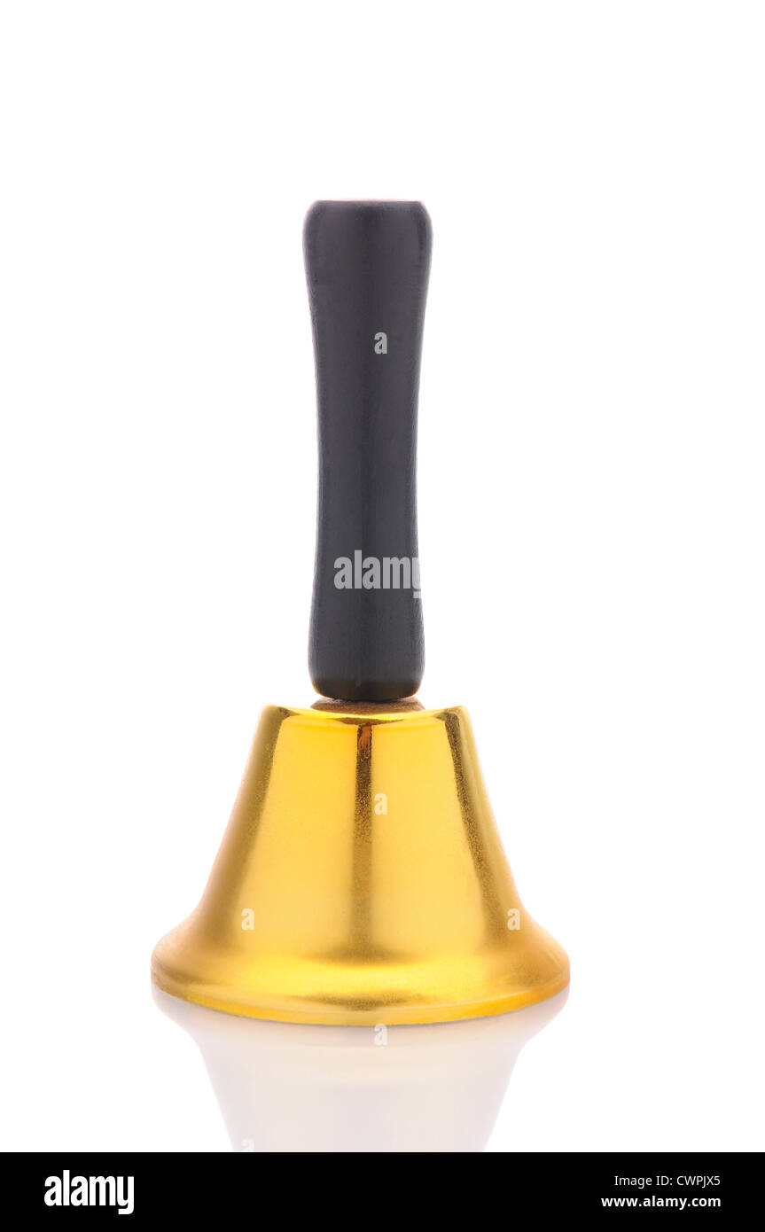 Gold Bell with Wood Handle over a white background with reflection ...