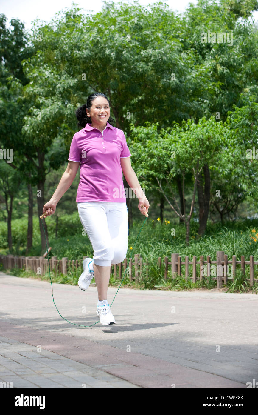 Women jump 50 hi-res stock photography and images - Alamy