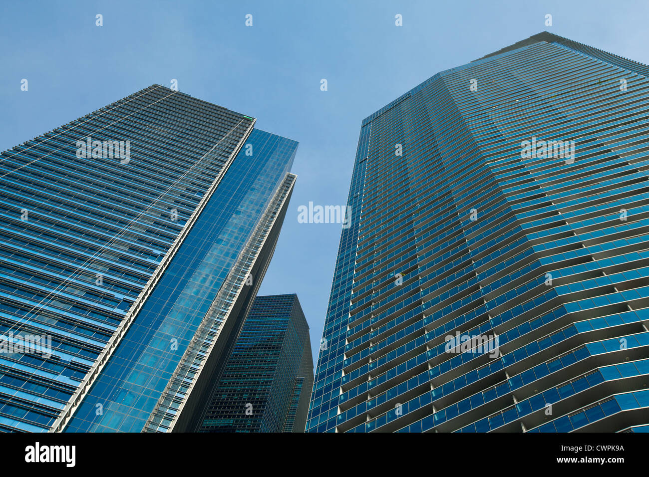 Skyscrapers on blue sky background Stock Photo - Alamy