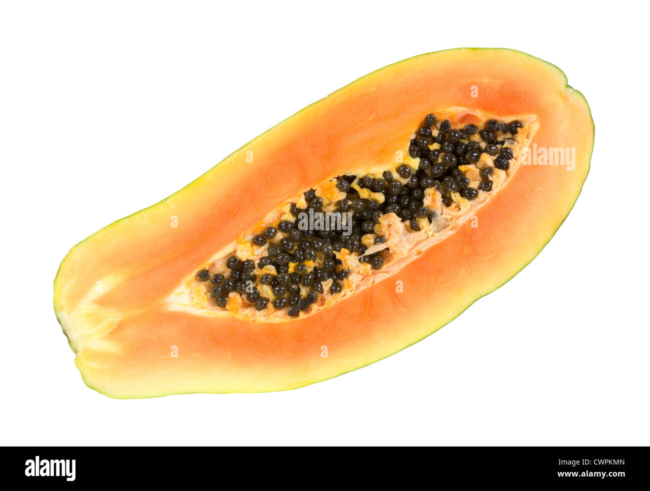 A ripe maradol red papaya that has been sliced in half showing the seed ...