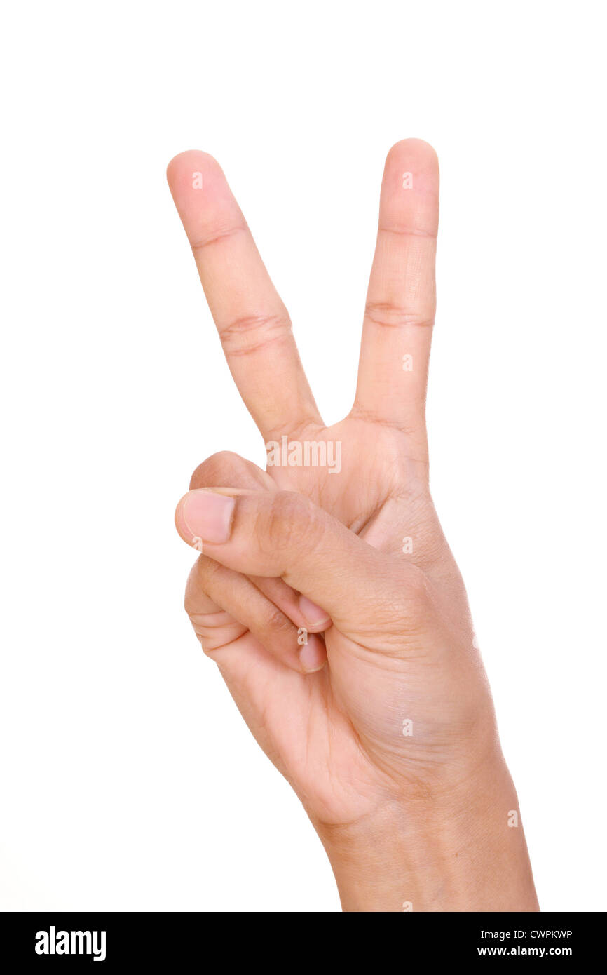 Hand with victory sign against white background Stock Photo - Alamy