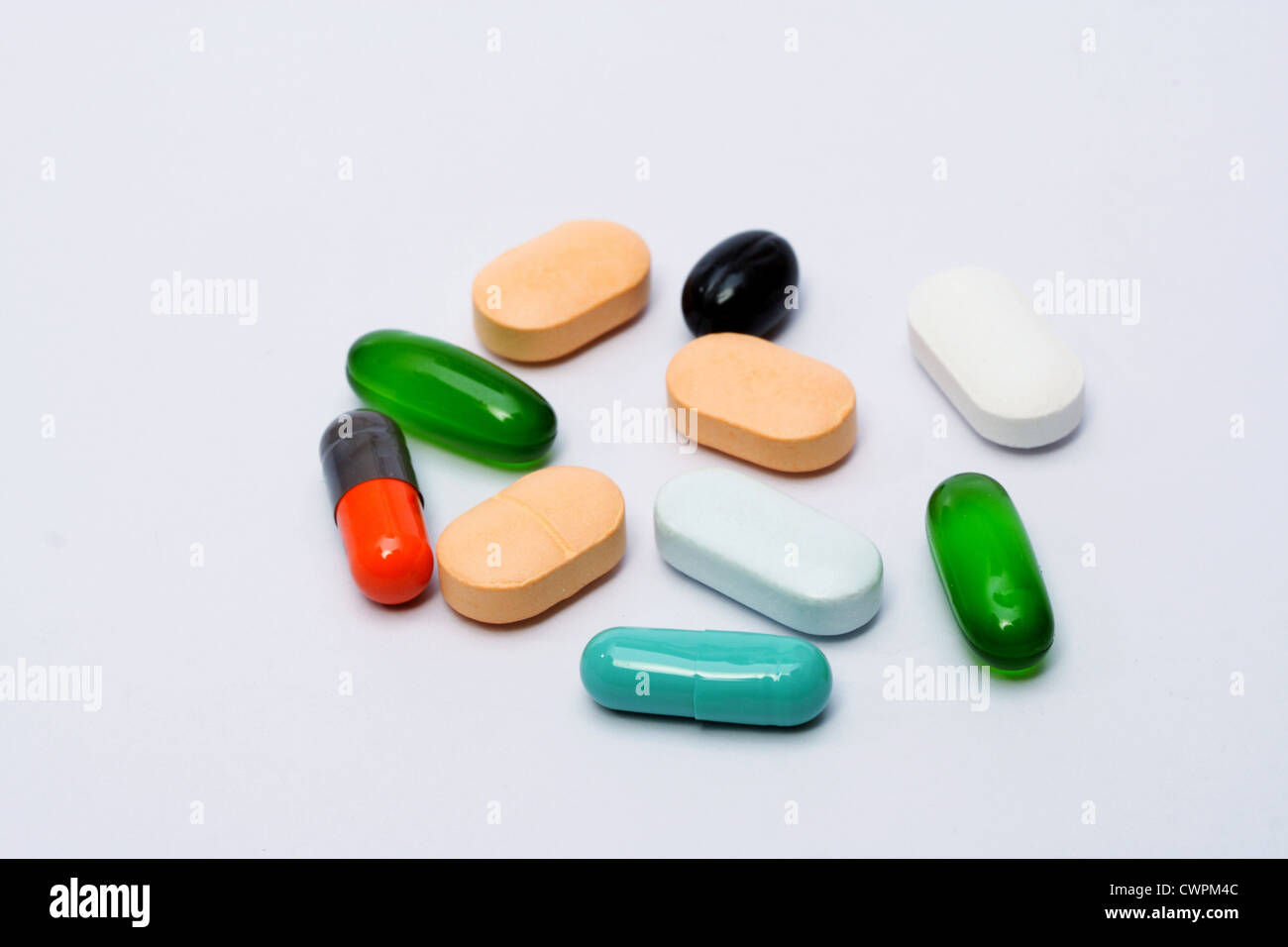 Assorted pills isolated on white background Stock Photo - Alamy
