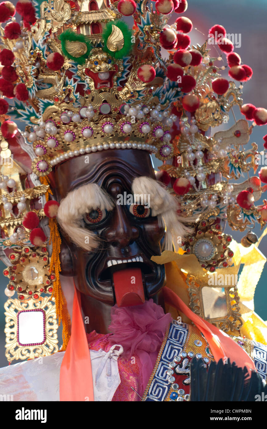 A mask of a taoist god at the "Pigs of God" festival around Chinese New ...