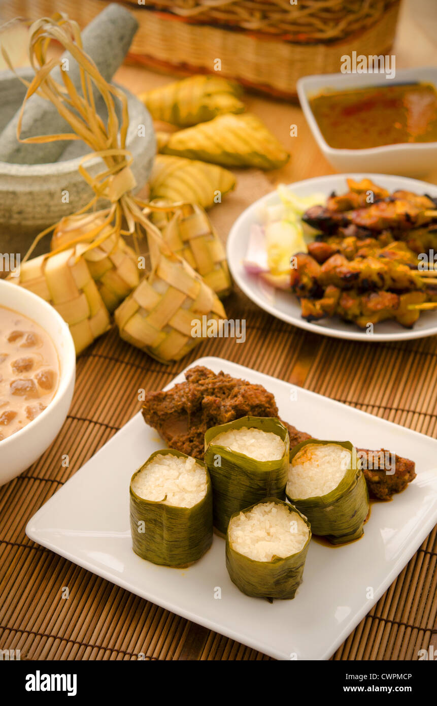 Malay traditional food lemang curry hi-res stock photography and images ...