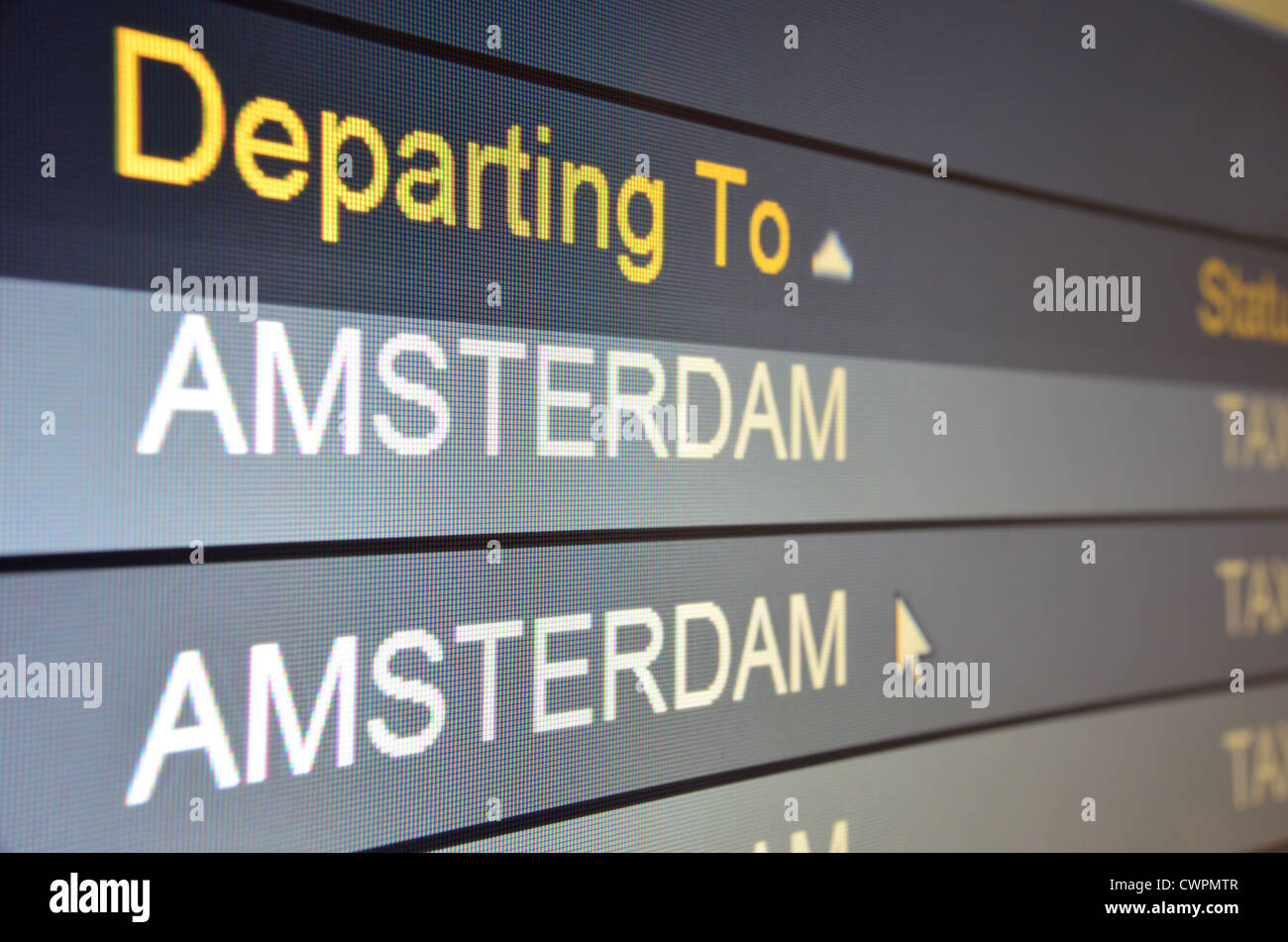 Computer screen closeup of Amsterdam flight status Stock Photo - Alamy