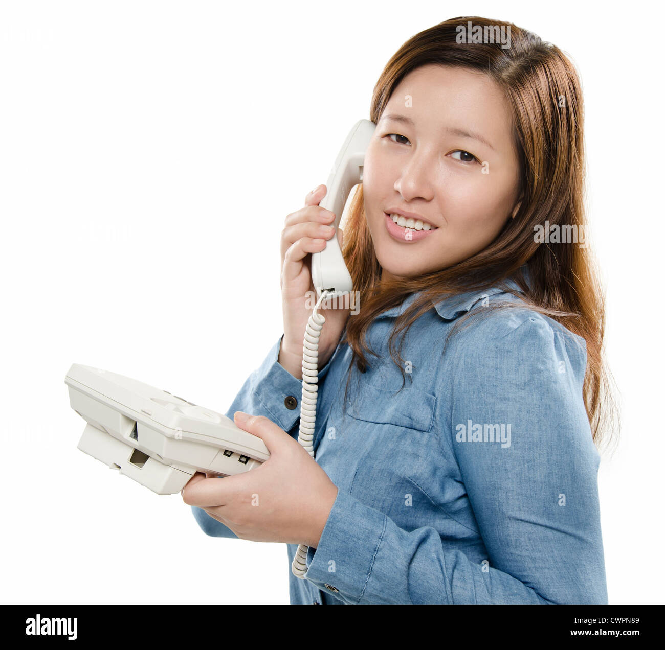 Smiling on the phone Stock Photo - Alamy
