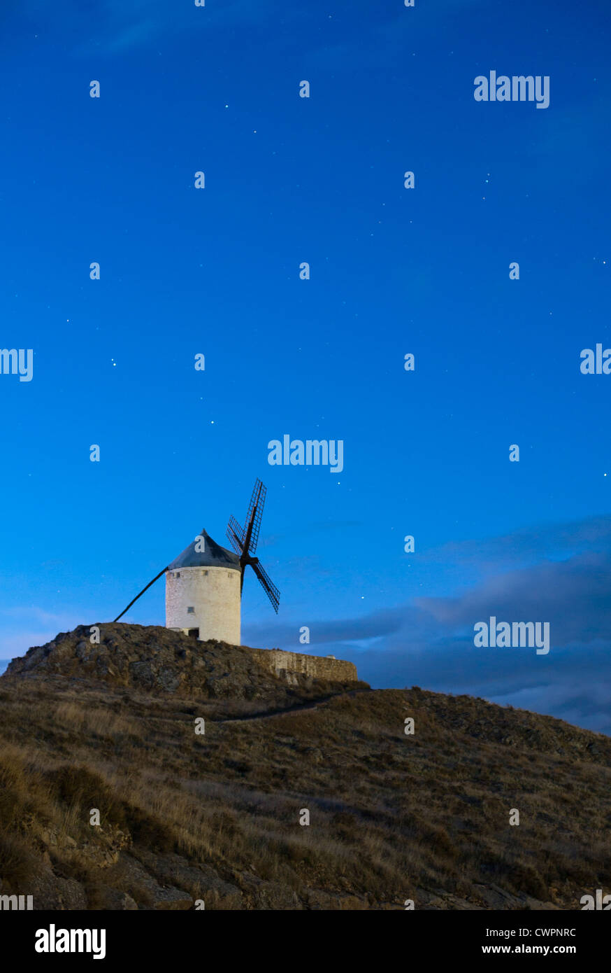 An old Spanish windmill on top of a hill near the town of Consuegra in ...