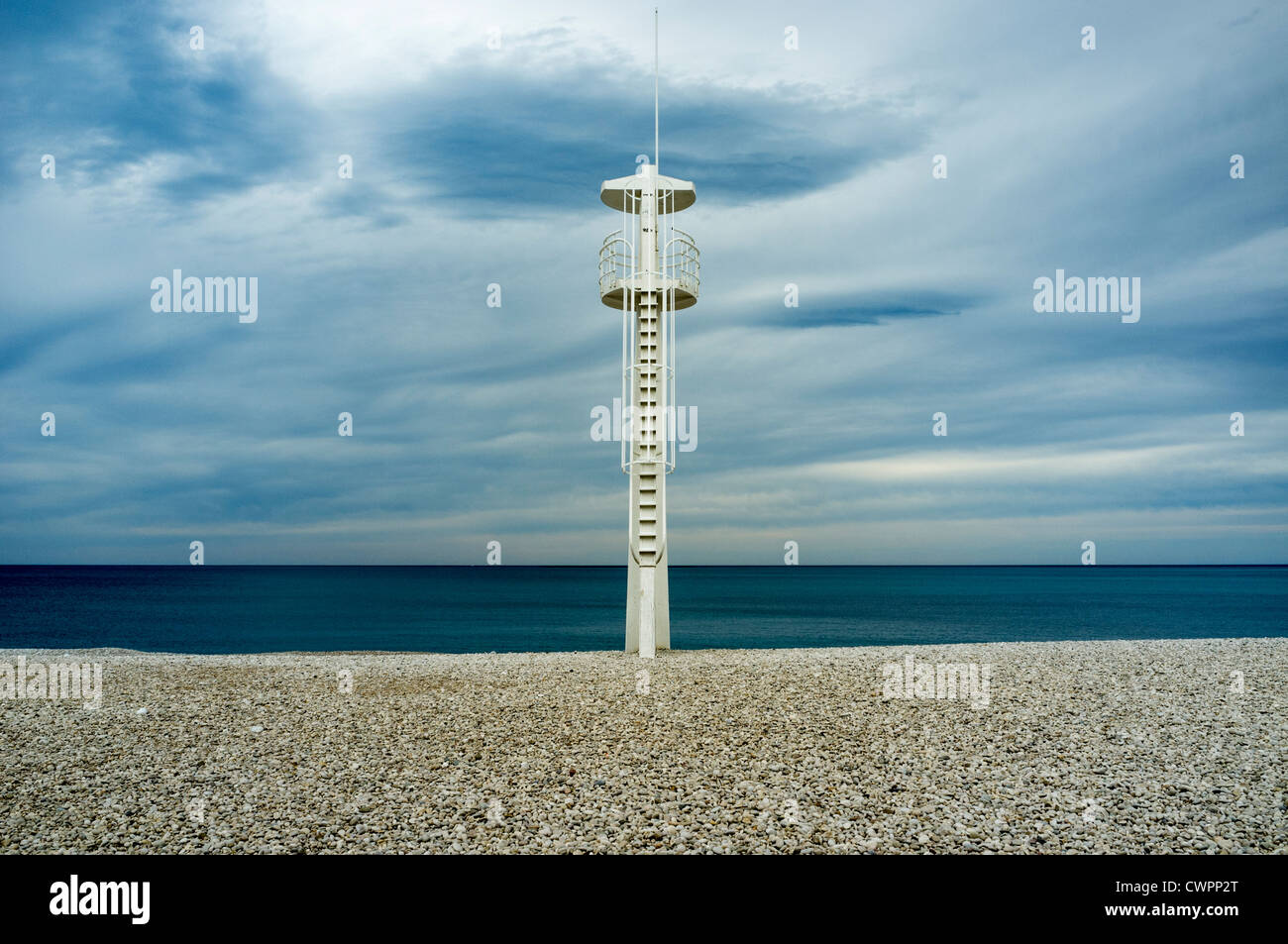 A lifeguard lookout tower on a Spanish beach against a stormy sky Stock ...