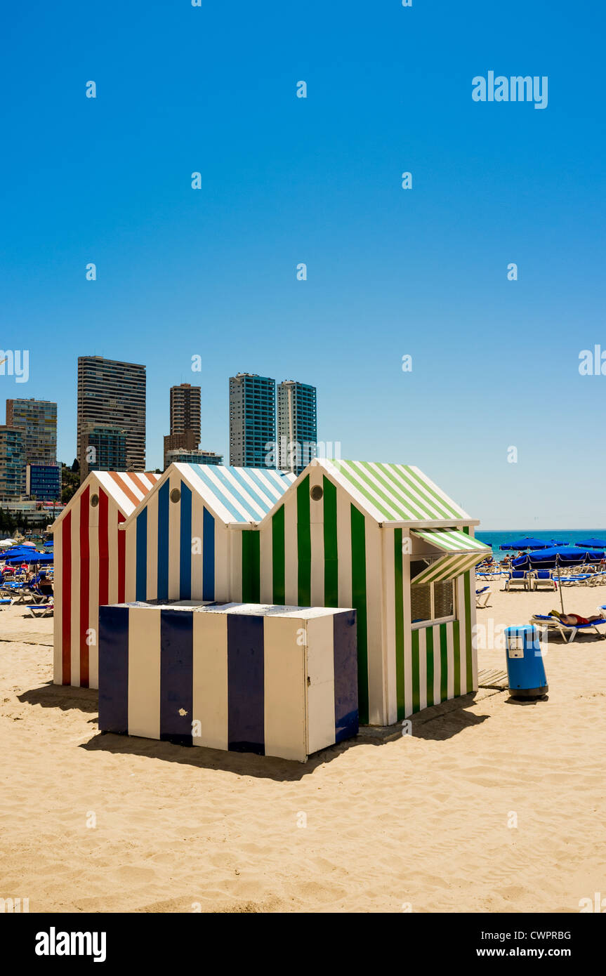 Colored changing huts on Benidorm,s Levante Beach Stock Photo - Alamy