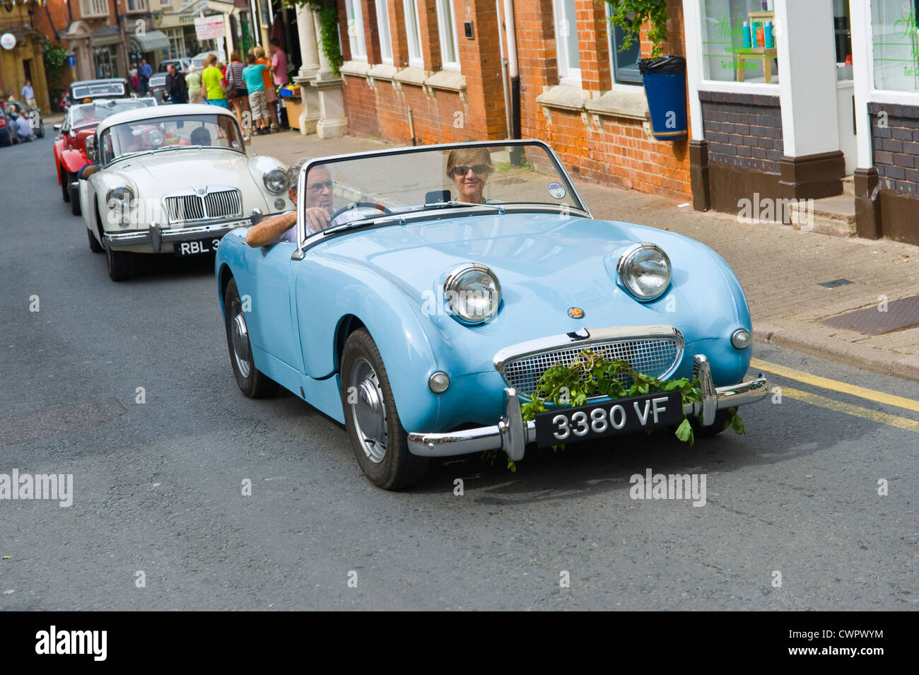 Austin Healey Frogeye Sprite in parade of vintage cars at opening of ...