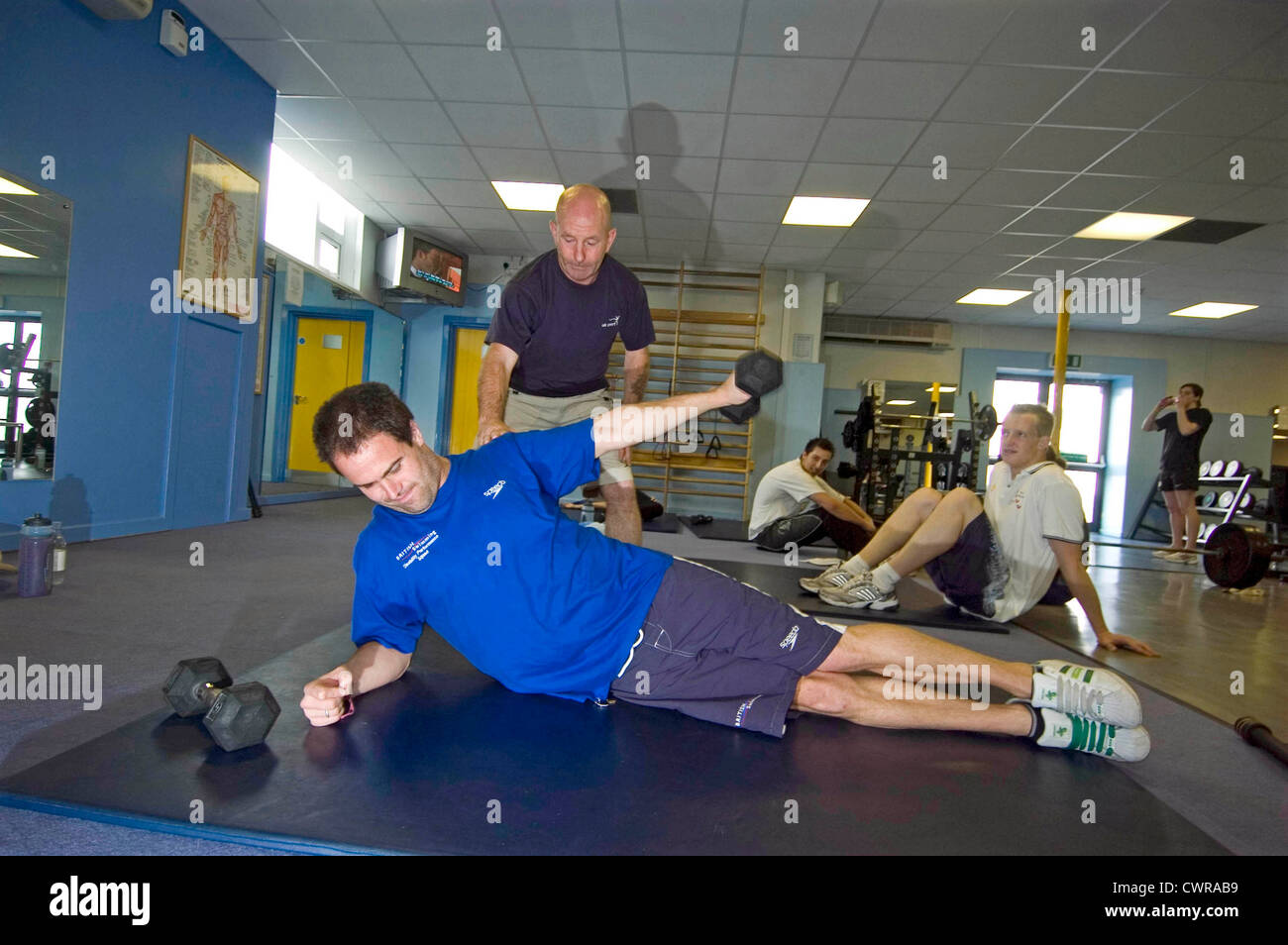Swimming Coach Billy Pye training Paralympian swimmer David Roberts CBE ...