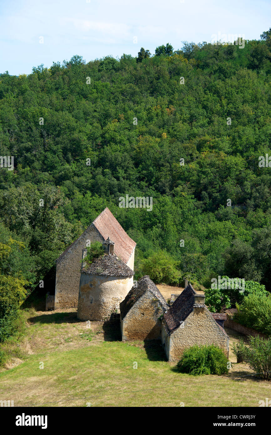 Outlying buildngs with Lauze (stone) roofs and forest outside the walls ...