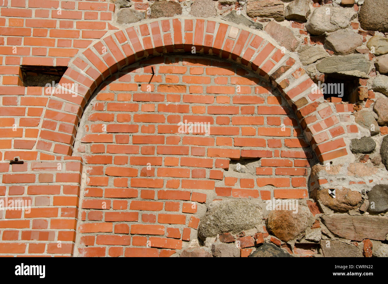 Background of ancient wall architecture made of red brick and stone ...