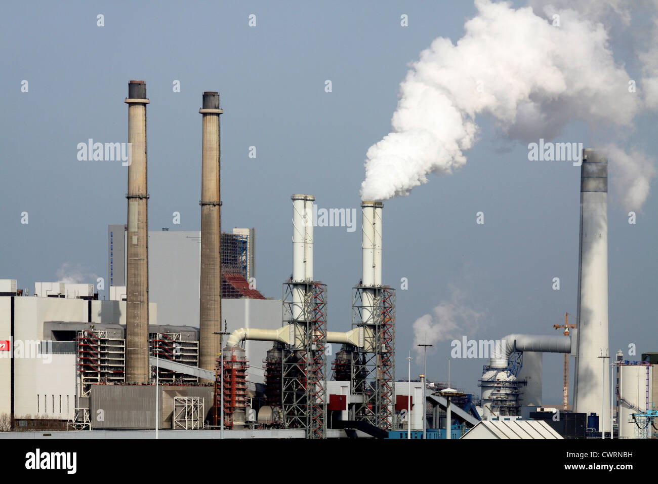 Power station chimneys belch out steam, Rotterdam Stock Photo - Alamy