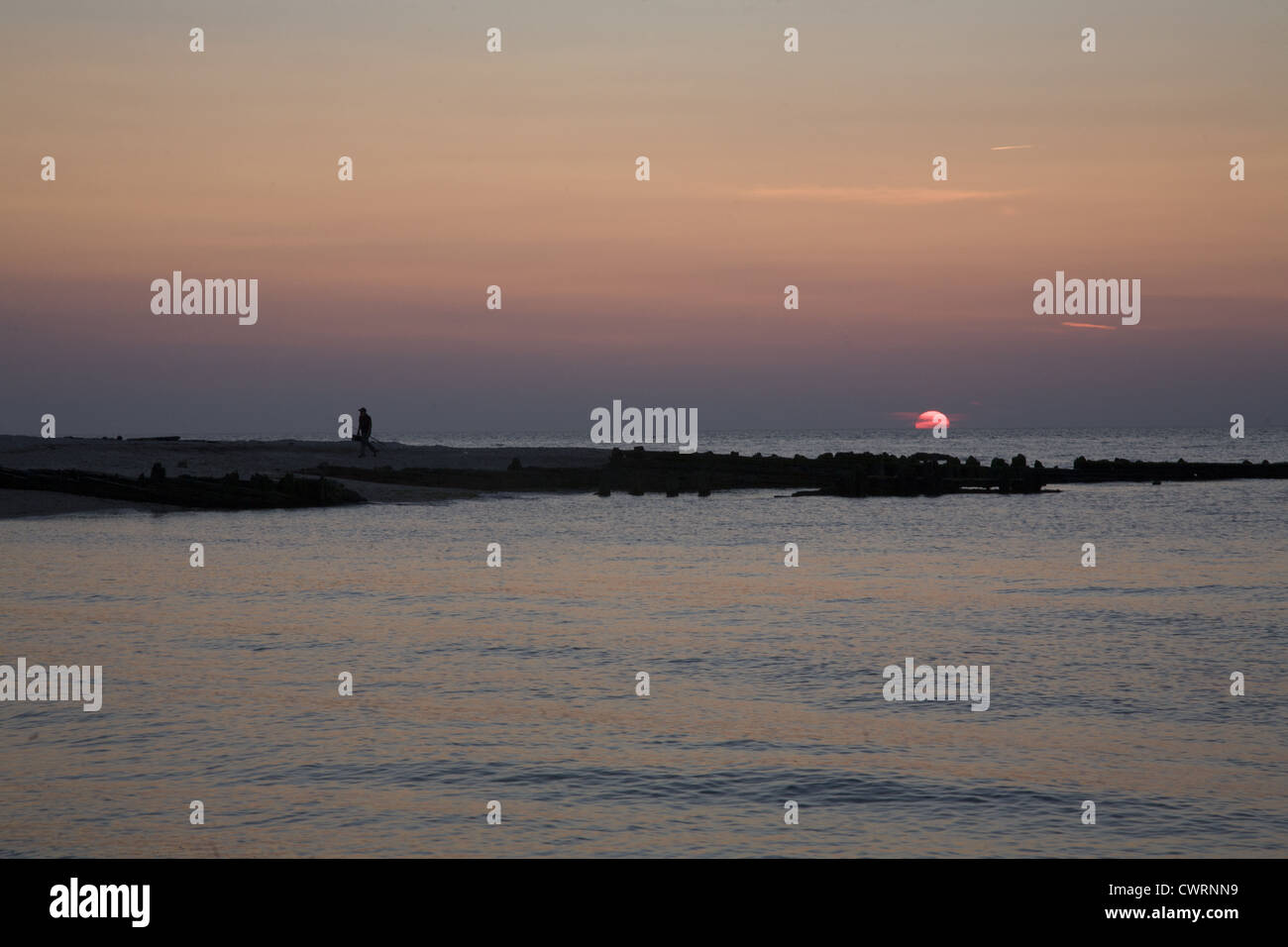 Fisherman heading home at sunset on Long Island Sound in Riverhead New ...