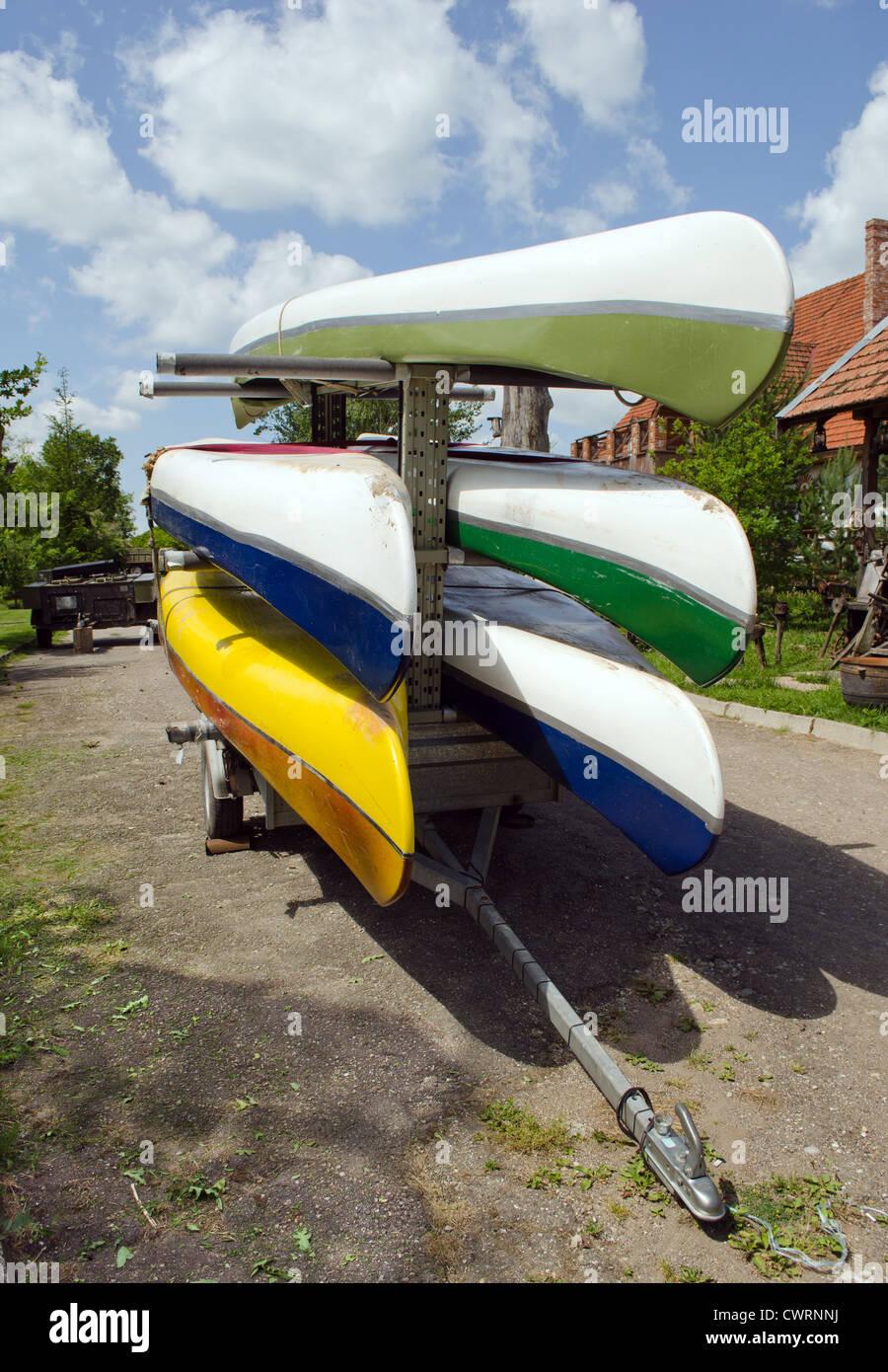 Kayaks canoes loaded on special transport trailer Stock Photo - Alamy