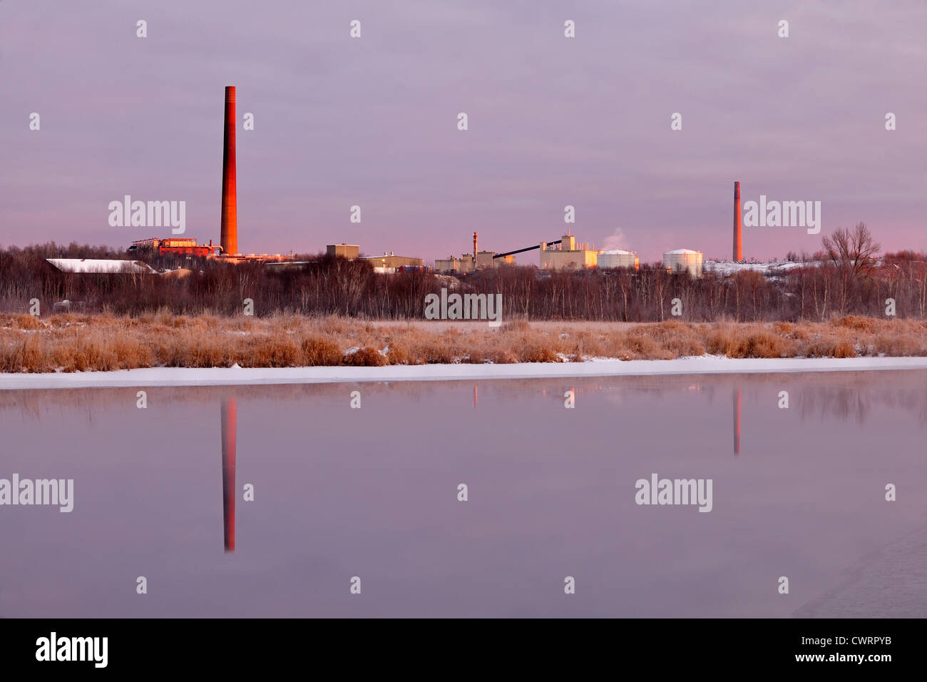 Vale Superstack reflected in Junction Creek, Greater Sudbury, Ontario ...