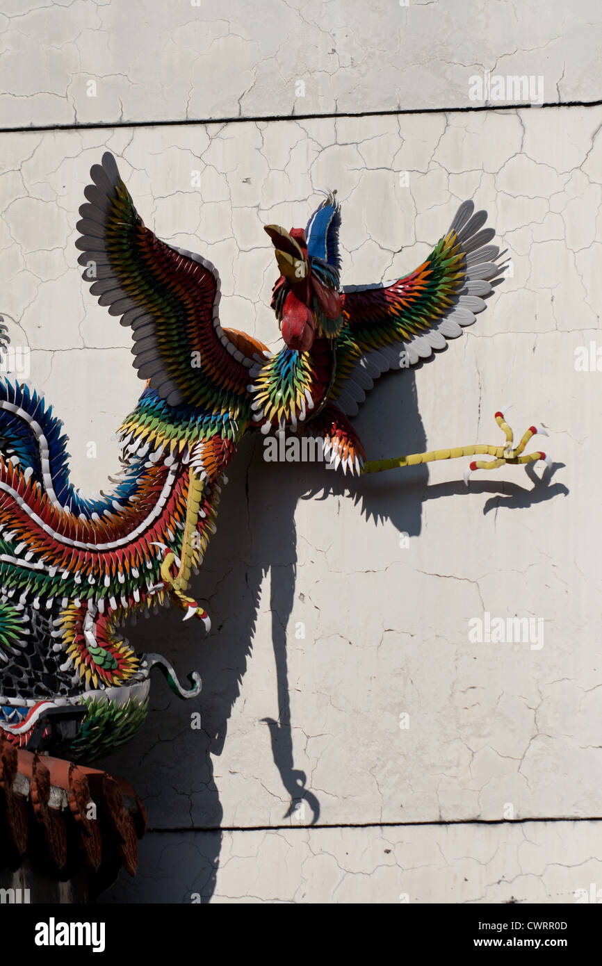 A Chinese Phoenix on a Taoist temple in Sanxia casts a shadow on the ...