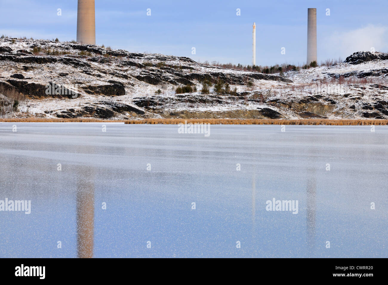 Vale Superstack reflected in Kelly Lake, Greater Sudbury, Ontario ...