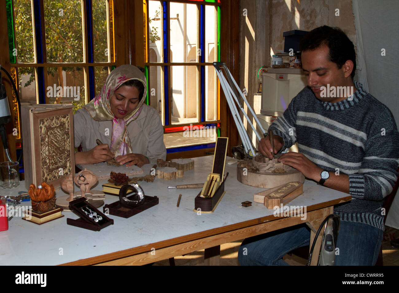Some wooden handicraft workers in the bazar of Ispahan Stock Photo - Alamy