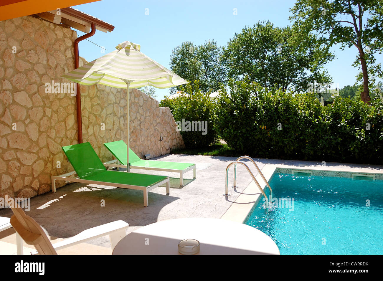 Outdoor swimming pool at luxury villa, Pieria, Greece Stock Photo - Alamy
