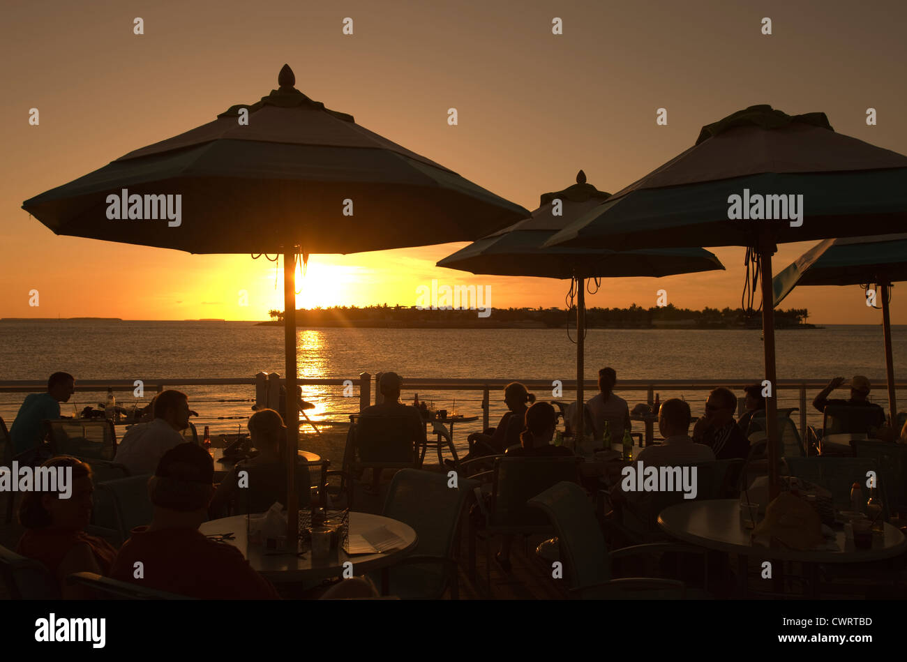 TOURISTS WATCHING SUNSET WESTIN HOTEL MALLORY SQUARE OLD TOWN HISTORIC ...