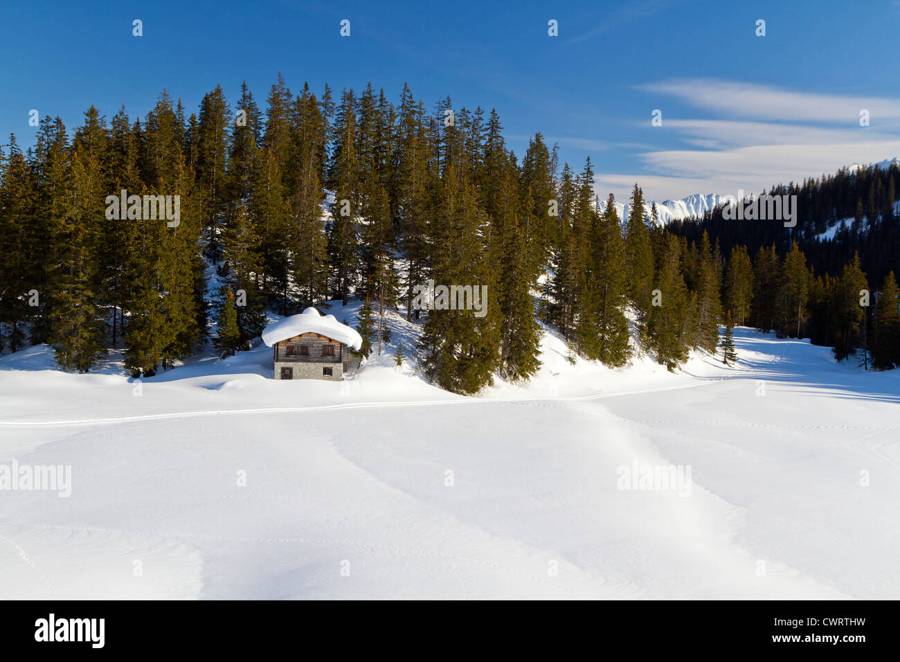 Log cabin in snow in the Alps Stock Photo - Alamy