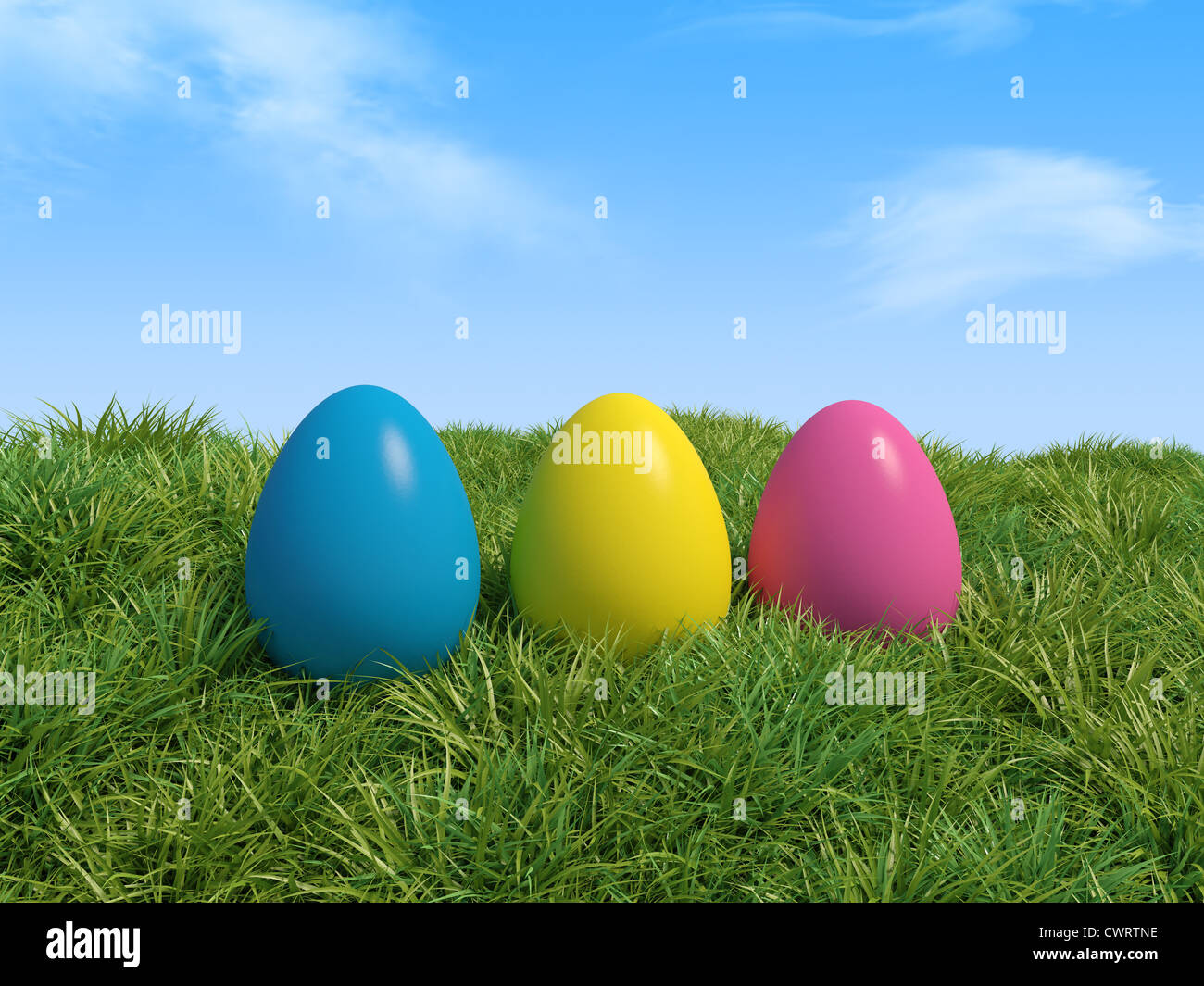 3d illustration of Easter eggs in green grass Stock Photo - Alamy