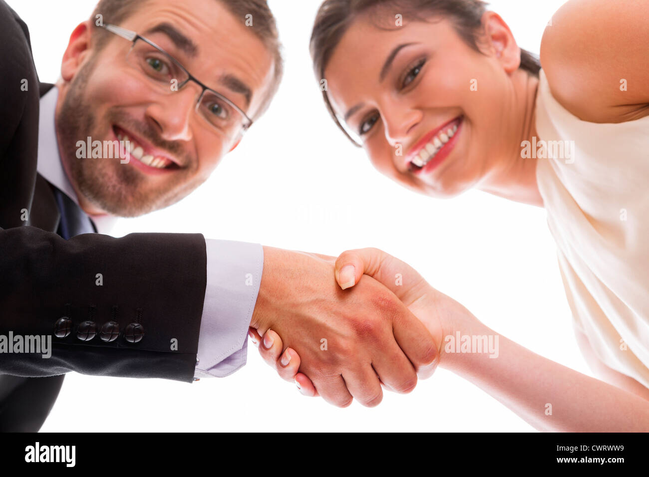 Happy and smiling businesswoman ans businessman handshaking over ...