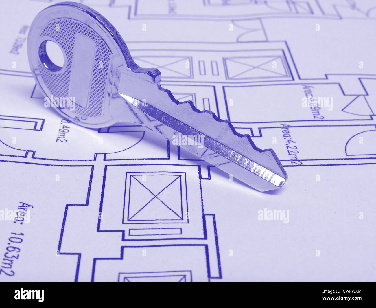 Architecture and real estate concept: House key on a house plan (Blue ...
