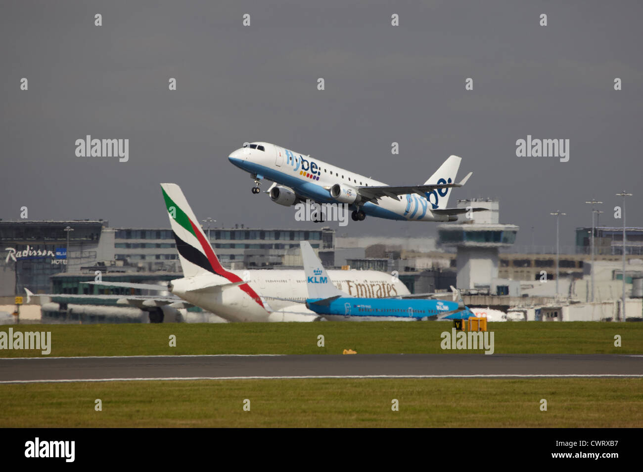 Flybe Embraer 175 take off at Manchester Airport Stock Photo - Alamy