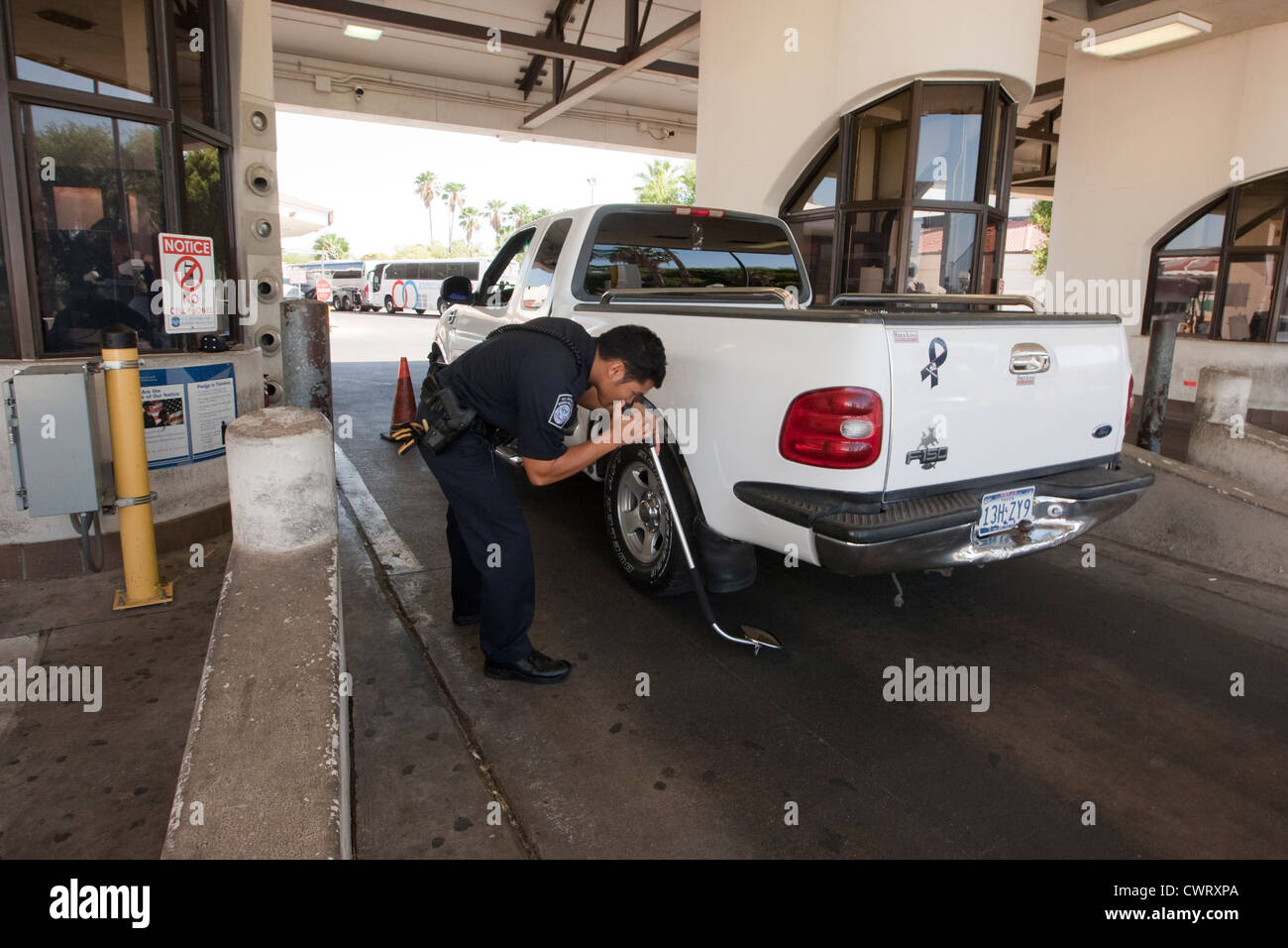 U.S Customs and Border Protection inspect cars, ask for documentation ...
