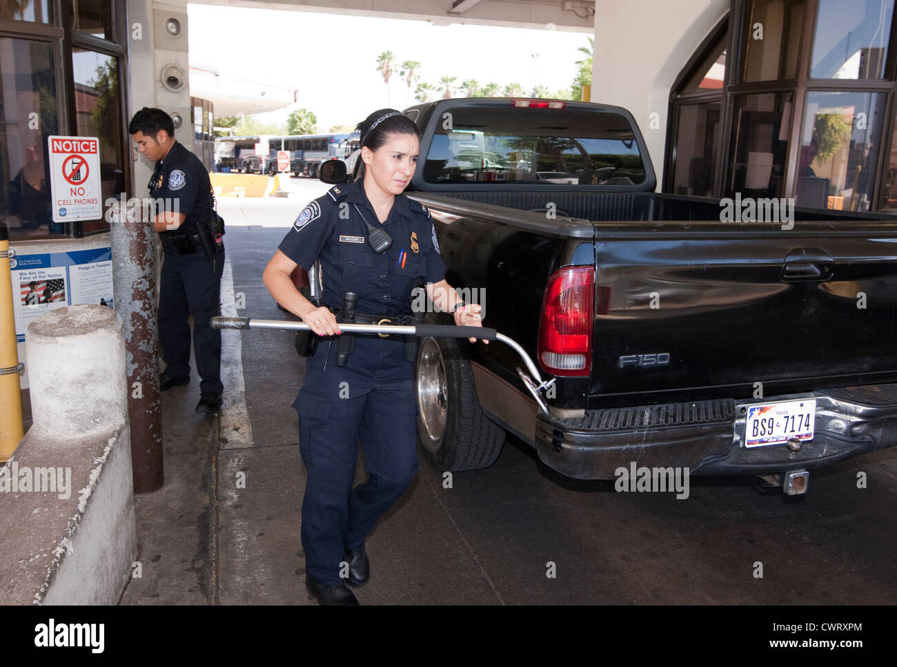 U.S Customs and Border Protection inspect cars, ask for documentation ...
