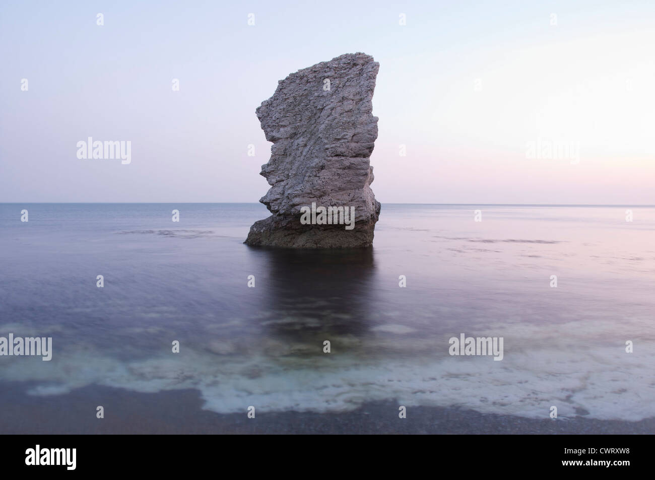 This lonely chalk stack called Butter Rock stands in the sea just off ...
