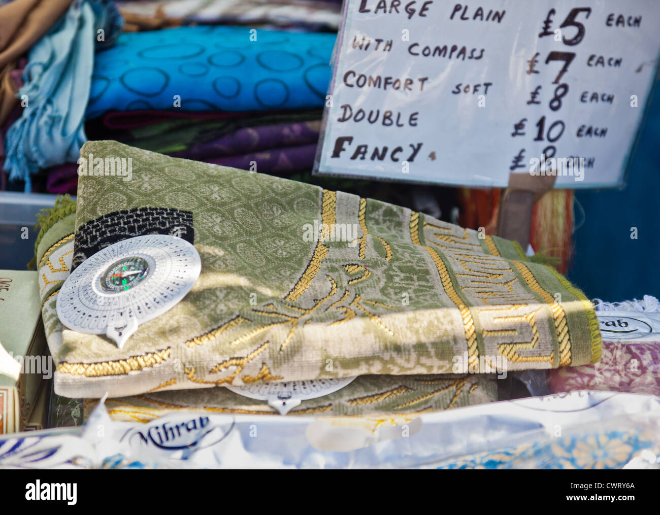 Prayer mat compass hi-res stock photography and images - Alamy