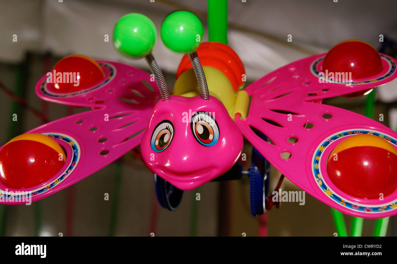 Colorful Toy Butterfly Hanging on Wall.Reddish Flying Butterfly concept ...