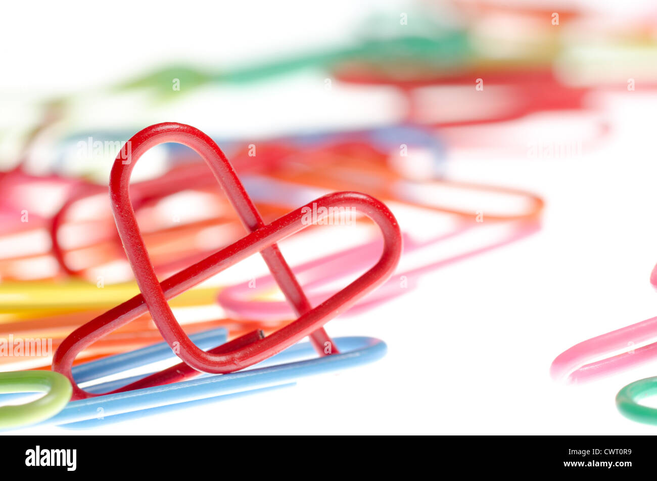 heart shape paper clip background Stock Photo - Alamy