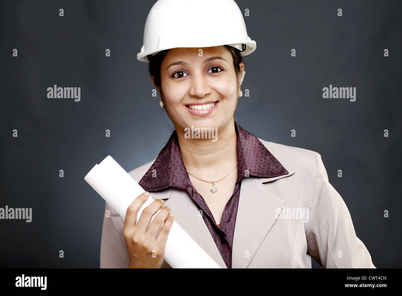 Confident young indian female construction hi-res stock photography and ...