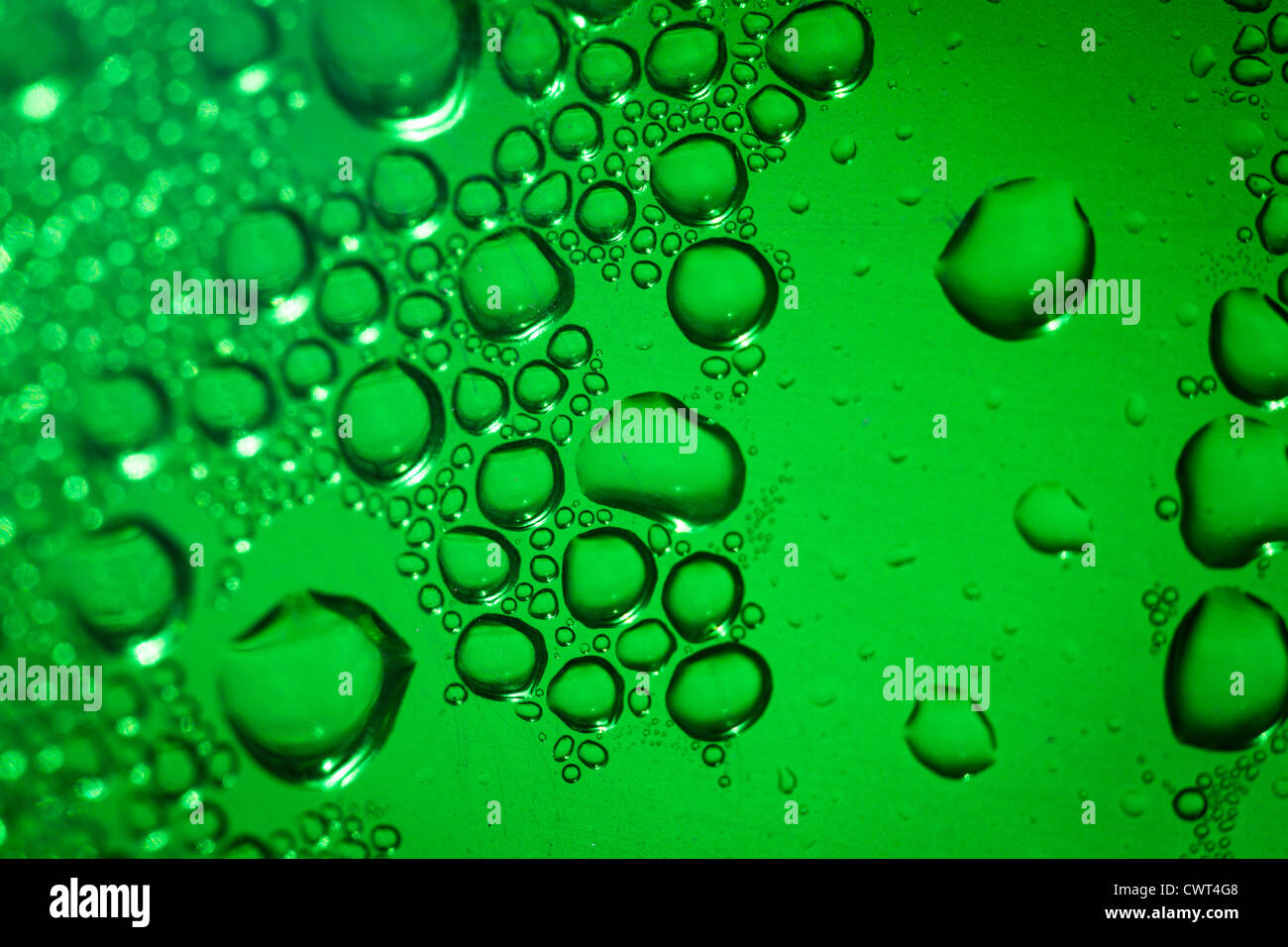 Refreshing green watery background (color toned image; shallow DOF ...