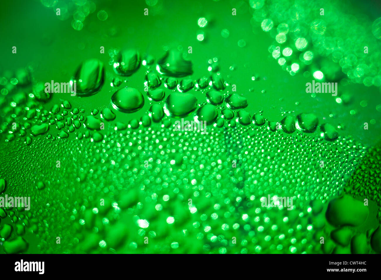 Refreshing green watery background (color toned image; shallow DOF ...