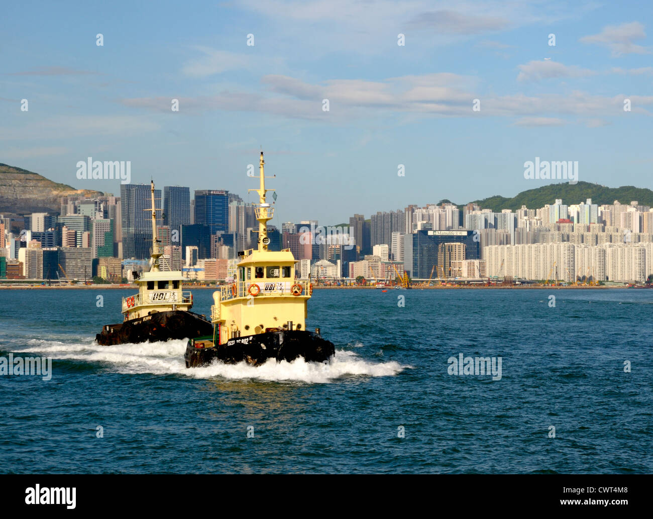 Tug boats on Victoria Harbour, Hong Kong Stock Photo - Alamy