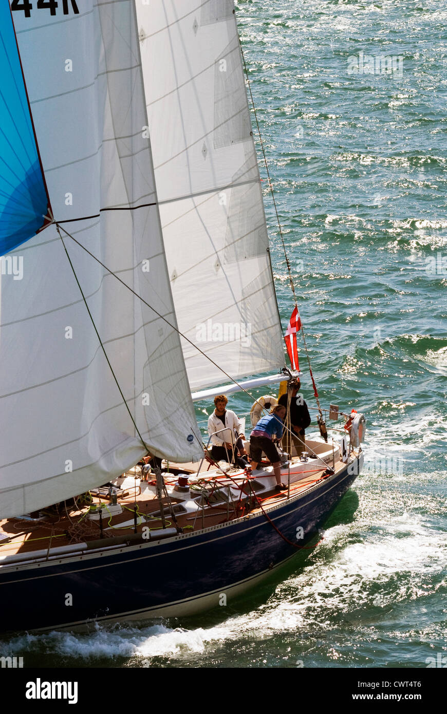 A sailing boat under sail in the Solent off the Isle of Wight, England ...