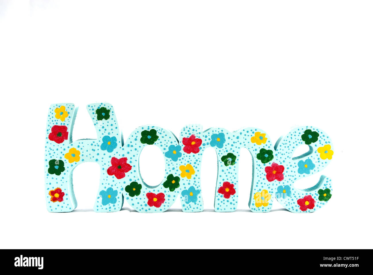 The word 'Home' cut out of wood and decorated Stock Photo - Alamy