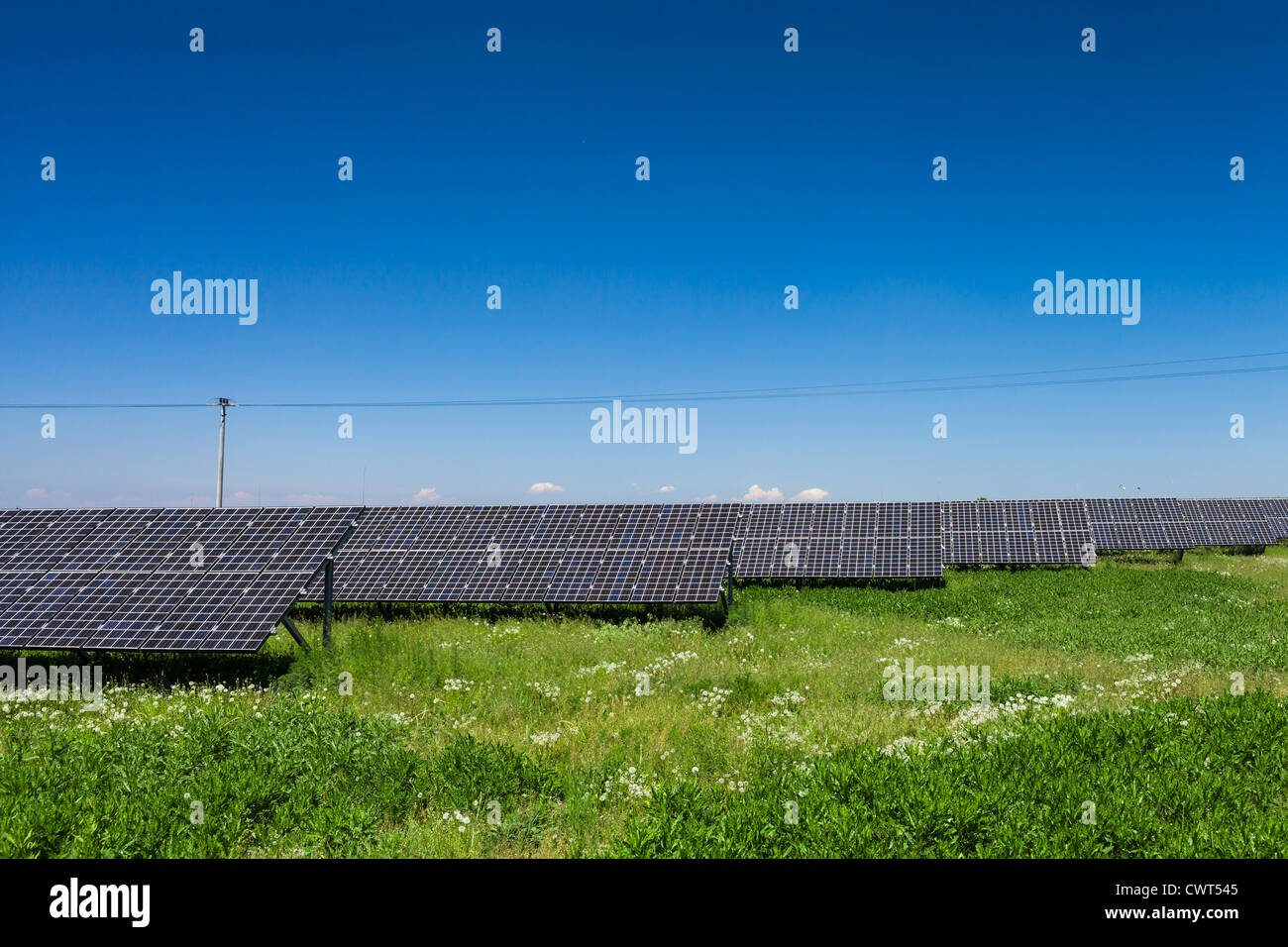Sunlight as a resource of renewable energy: solar panels on a sunny day ...