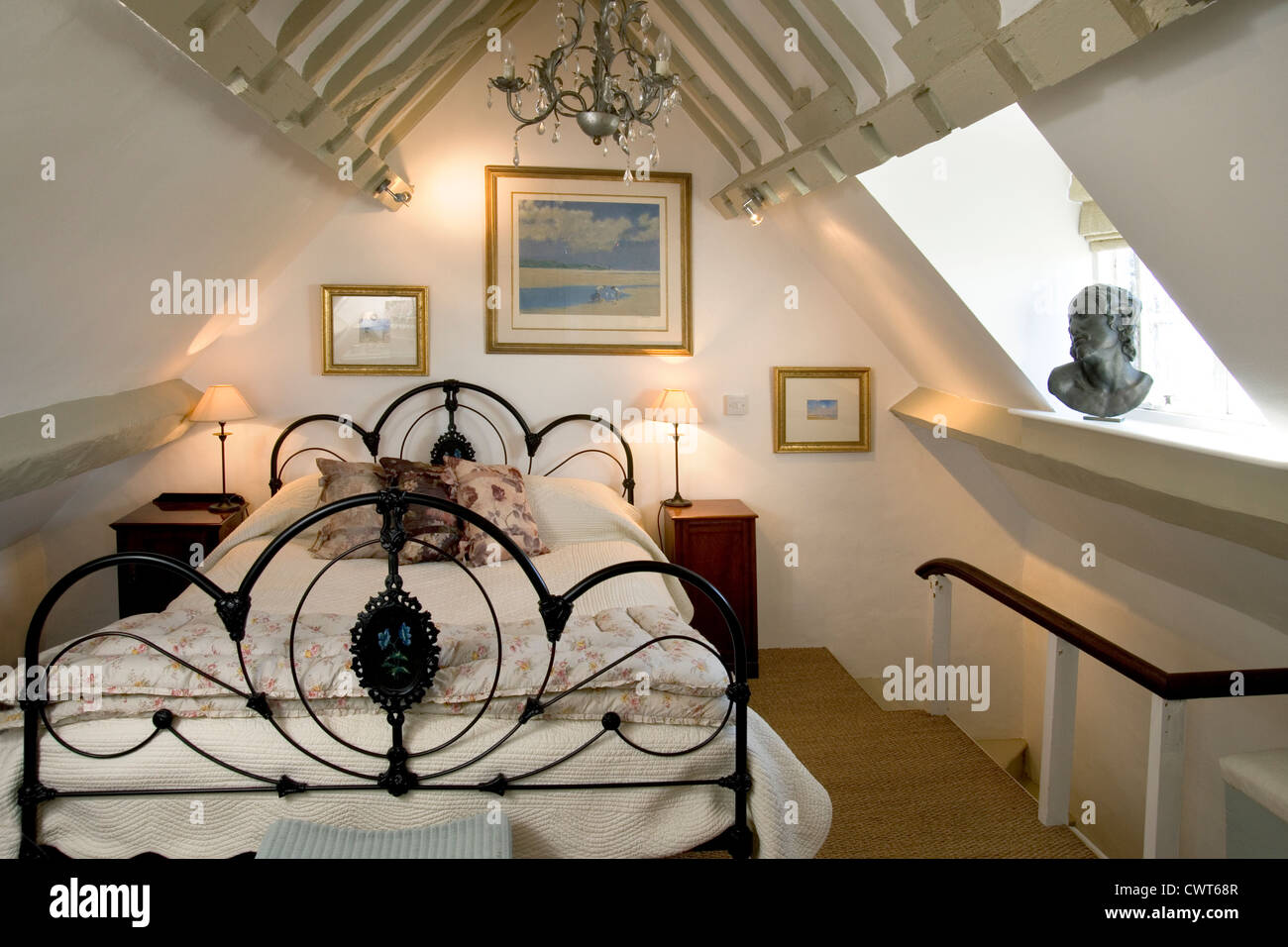 Pretty little attic bedroom Stock Photo - Alamy