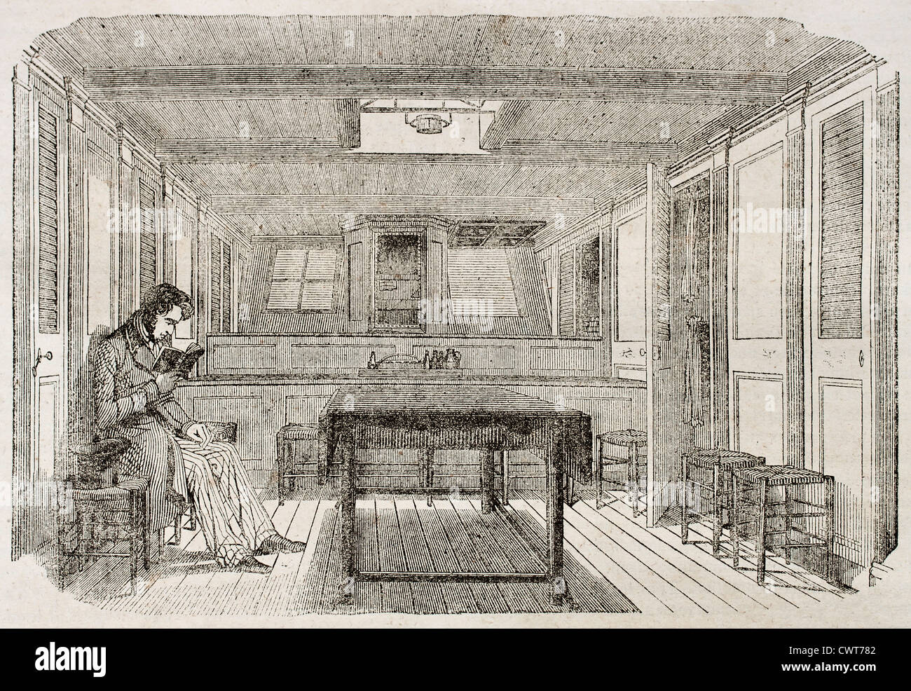 Man reading in the cabin of a merchant brig Stock Photo - Alamy