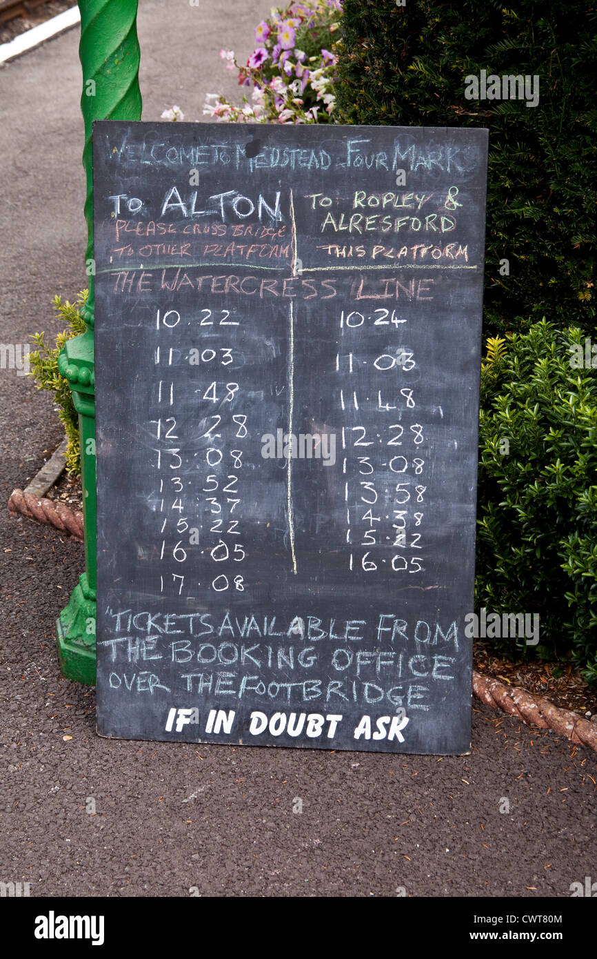 Train times sign at the Medstead and Four Marks station on the ...